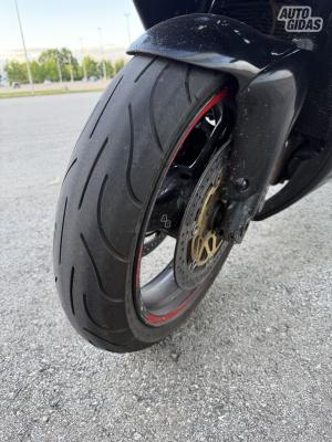 Melns Kawasaki Zx-6R 1999 Kauņa, ar dzinēja tilpumu 0.60 L un nobraukumu 40 tūkst. km par 1250 €, foto 6 vietnē AUTOMOTO.COM.LV