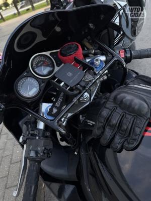 Black Kawasaki Zx-6R 1999 in Kaunas, with an engine capacity of 0.60 L and mileage of 40 thousand km for 1149 €, photo 4 on AUTOMOTO.COM.LV