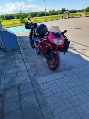 Sarkans Kawasaki ZX-9R 1999 Radviliškis, ar dzinēja tilpumu 0.90 L un nobraukumu 74 tūkst. km par 1800 €, foto 3 vietnē AUTOMOTO.COM.LV