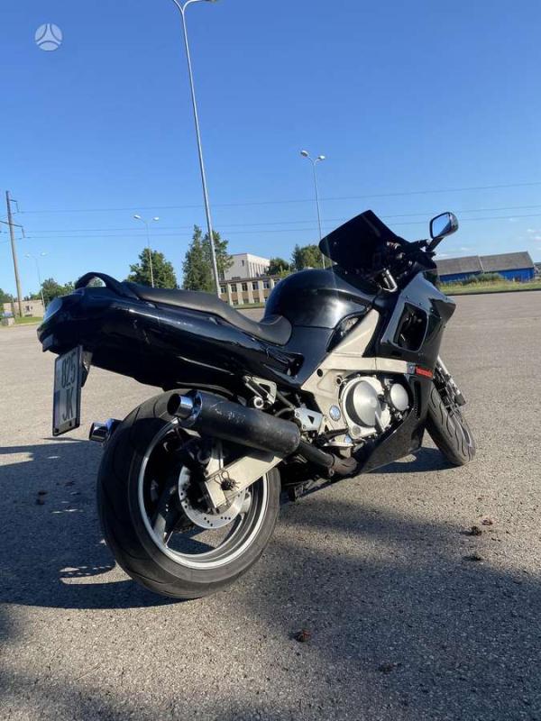 Melns Kawasaki ZZR 1994 Kauņa, ar dzinēja tilpumu 0.60 L un nobraukumu 74 tūkst. km par 1050 €, foto 8 vietnē AUTOMOTO.COM.LV