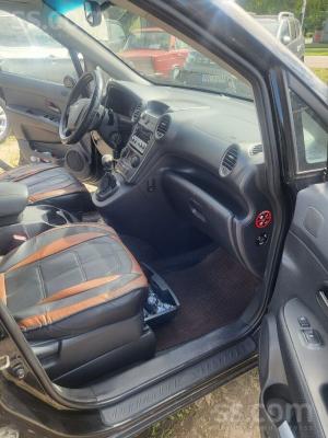 Black Kia Carens 2007 in Riga, with an engine capacity of 2.00 L and mileage of 324 thousand km for 1750 €, photo  on AUTOMOTO.COM.LV