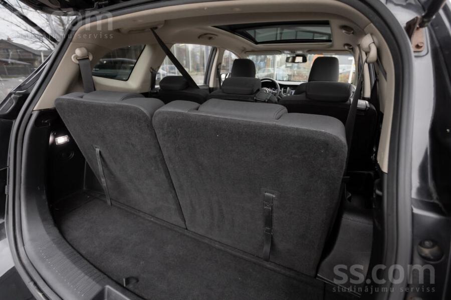 Black Kia Carens 2013 in Jelgava, with an engine capacity of 1.70 L and mileage of 0 thousand km for 7490 €, photo 20 on AUTOMOTO.COM.LV