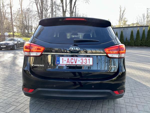 Black Kia Carens 2014 in Siauliai, with an engine capacity of 1.70 L and mileage of 269 thousand km for 6500 €, photo 8 on AUTOMOTO.COM.LV