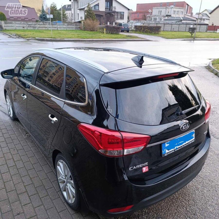 Black Kia Carens 2016 in Kaunas, with an engine capacity of 1.70 L and mileage of 178 thousand km for 7250 €, photo 1 on AUTOMOTO.COM.LV
