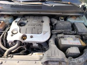 Zils Kia Carens 2007 Rīga, ar dzinēja tilpumu 2.00 L un nobraukumu 285 tūkst. km par 1150 €, foto 12 vietnē AUTOMOTO.COM.LV