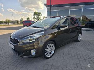 Brown Kia Carens 2014 in Taurage, with an engine capacity of 1.69 L and mileage of 262 thousand km for 4990 €, photo  on AUTOMOTO.COM.LV