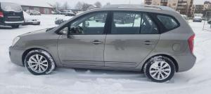 Grey Kia Carens 2011 in Kedainiai, with an engine capacity of 1.58 L and mileage of 231 thousand km for 2999 €, photo 7 on AUTOMOTO.COM.LV