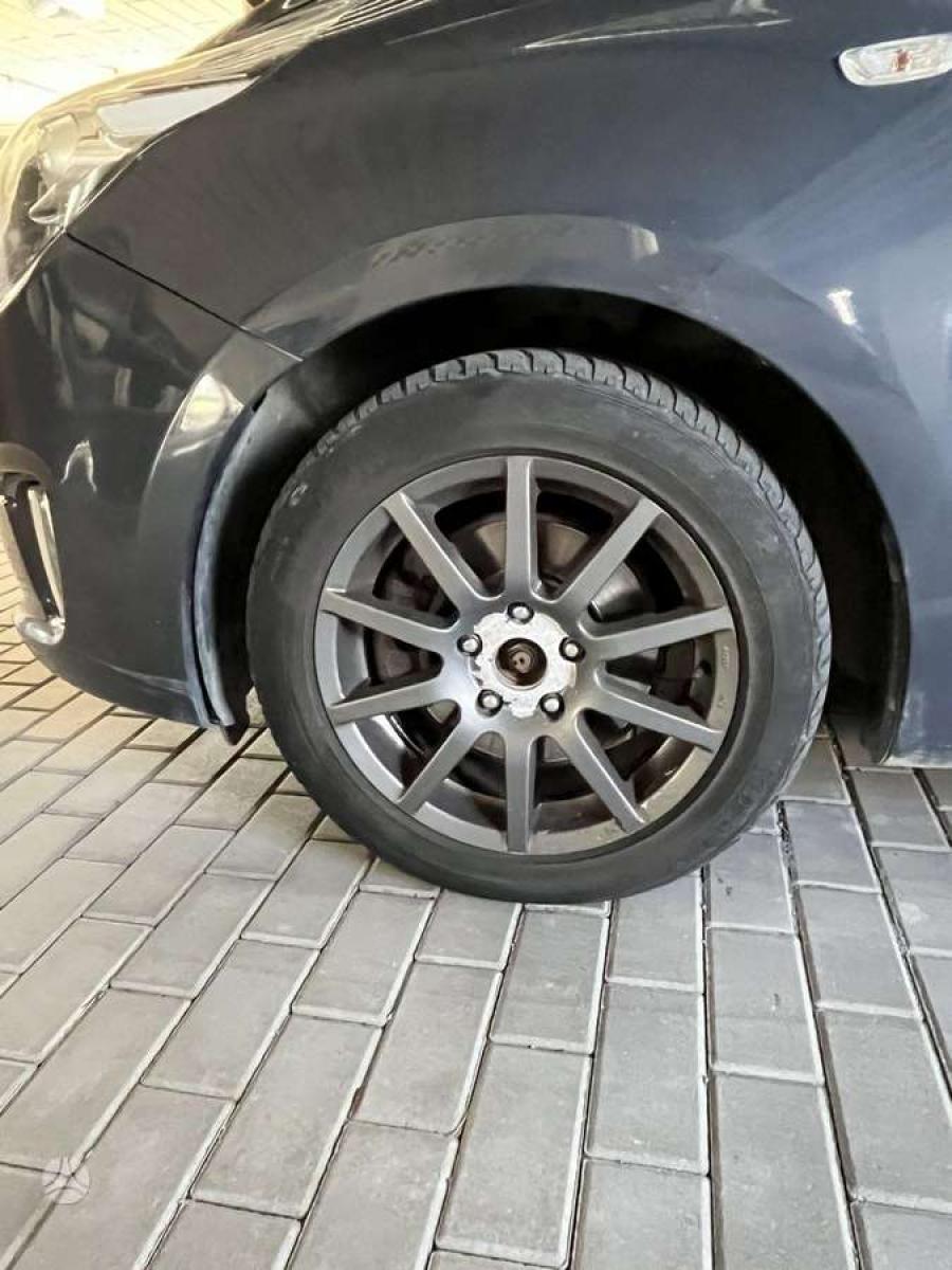 Grey Kia Carens 2014 in Kaunas, with an engine capacity of 1.70 L and mileage of 283 thousand km for 4100 €, photo 14 on AUTOMOTO.COM.LV