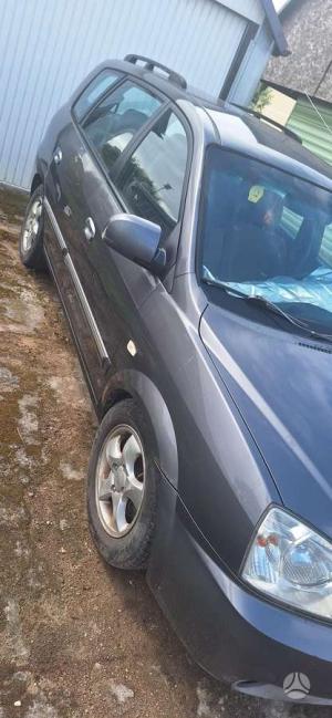 Pelēks Kia Carens 2006 Šauļi, ar dzinēja tilpumu 1.98 L un nobraukumu 225 tūkst. km par 600 €, foto 3 vietnē AUTOMOTO.COM.LV