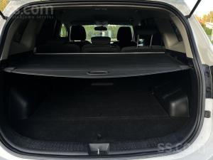White Kia Carens 2015 in Riga, with an engine capacity of 1.70 L and mileage of 180 thousand km for 4950 €, photo 23 on AUTOMOTO.COM.LV