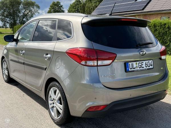 Yellow Kia Carens 2013 in Kaunas, with an engine capacity of 1.69 L and mileage of 190 thousand km for 5550 €, photo 4 on AUTOMOTO.COM.LV