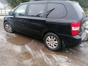 Black Kia Carnival 2009 in Marijampole, with an engine capacity of 2.90 L and mileage of 285 thousand km for 850 €, photo 2 on AUTOMOTO.COM.LV