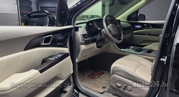 Black Kia Carnival 2022 in Tallinn, with an engine capacity of 2.20 L and mileage of 82 thousand km for 38880 €, photo 5 on AUTOMOTO.COM.LV