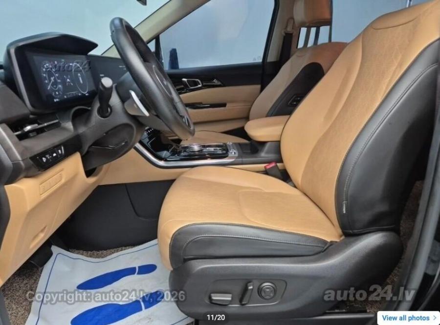 Black Kia Carnival 2023 in Tallinn, with an engine capacity of 2.20 L and mileage of 85 thousand km for 38880 €, photo 6 on AUTOMOTO.COM.LV