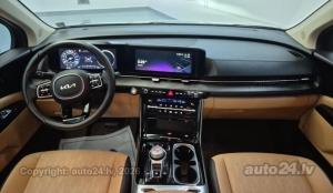 Black Kia Carnival 2023 in Tallinn, with an engine capacity of 2.20 L and mileage of 85 thousand km for 38880 €, photo 7 on AUTOMOTO.COM.LV