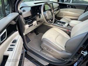 Black Kia Carnival 2024 in Tallinn, with an engine capacity of 2.20 L and mileage of 65 thousand km for 48880 €, photo 8 on AUTOMOTO.COM.LV