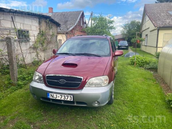 Sarkans Kia Carnival 2006 Preiļi, ar dzinēja tilpumu 2.90 L un nobraukumu 159 tūkst. km par 1900 €, foto 1 vietnē AUTOMOTO.COM.LV