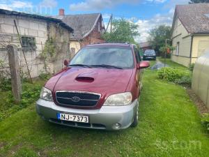 Red Kia Carnival 2006 in Preili, with an engine capacity of 2.90 L and mileage of 159 thousand km for 1900 €, photo  on AUTOMOTO.COM.LV
