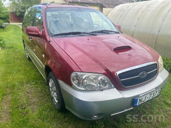 Sarkans Kia Carnival 2006 Preiļi, ar dzinēja tilpumu 2.90 L un nobraukumu 159 tūkst. km par 1900 €, foto 3 vietnē AUTOMOTO.COM.LV