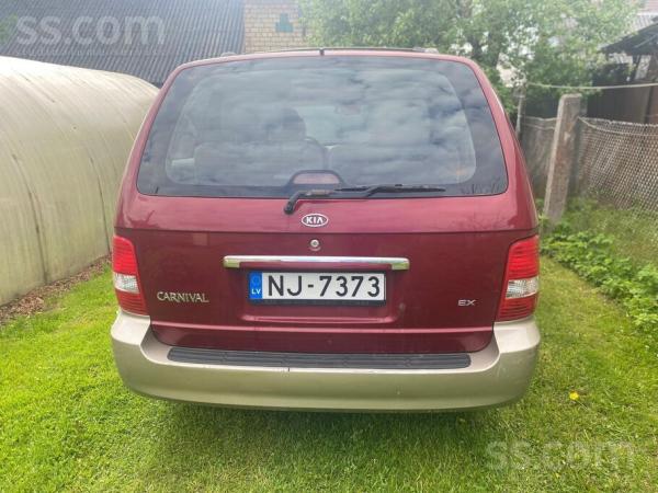 Sarkans Kia Carnival 2006 Preiļi, ar dzinēja tilpumu 2.90 L un nobraukumu 159 tūkst. km par 1900 €, foto 6 vietnē AUTOMOTO.COM.LV
