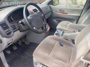 Red Kia Carnival 2006 in Preili, with an engine capacity of 2.90 L and mileage of 159 thousand km for 1900 €, photo 10 on AUTOMOTO.COM.LV