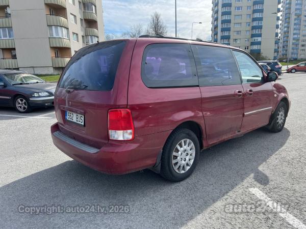 Red Kia Carnival 2002 in Tallinn, with an engine capacity of 2.90 L and mileage of 246 thousand km for 590 €, photo 3 on AUTOMOTO.COM.LV