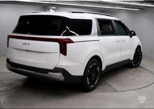 White Kia Carnival 2024 in Vilnius, with an engine capacity of 2.15 L and mileage of 103 thousand km for 37000 €, photo 3 on AUTOMOTO.COM.LV