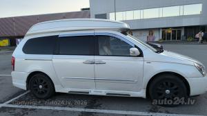White Kia Carnival 2011 in Kohtla-Jarve, with an engine capacity of 2.20 L and mileage of 200 thousand km for 10000 €, photo  on AUTOMOTO.COM.LV