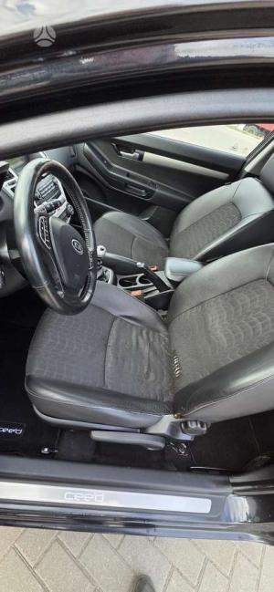 Black Kia Ceed 2008 in Kaunas, with an engine capacity of 1.58 L and mileage of 280 thousand km for 1990 €, photo 20 on AUTOMOTO.COM.LV