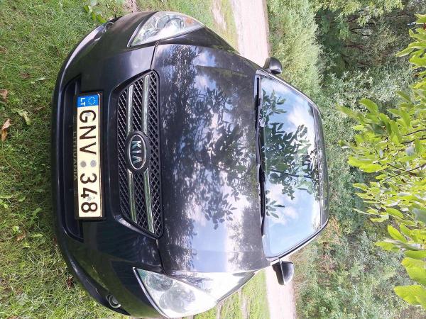 Black Kia Ceed 2008 in Kaunas, with an engine capacity of 1.58 L and mileage of 255 thousand km for 1100 €, photo 5 on AUTOMOTO.COM.LV