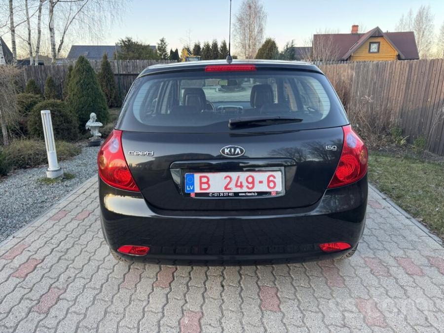Black Kia Ceed 2010 in Ogre, with an engine capacity of 1.40 L and mileage of 93 thousand km for 4150 €, photo 12 on AUTOMOTO.COM.LV