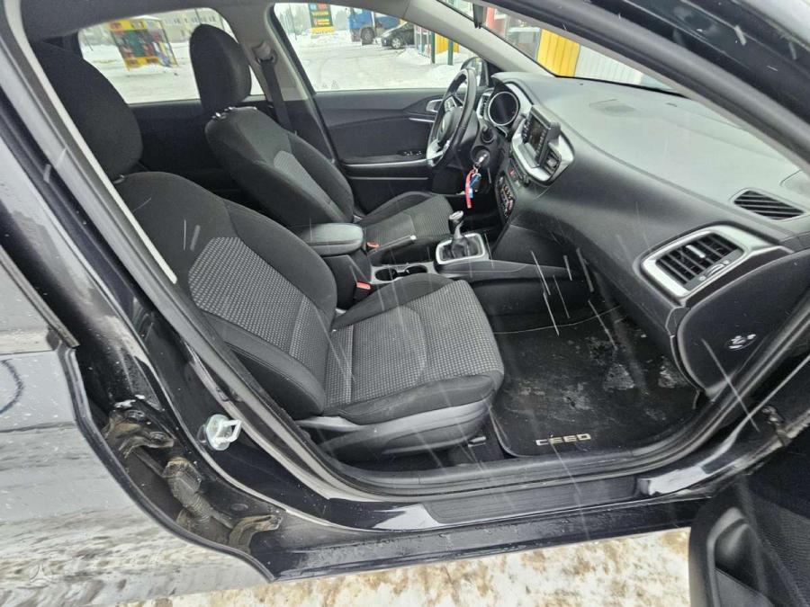 Black Kia Ceed 2019 in Kaunas, with an engine capacity of 1.40 L and mileage of 141 thousand km for 7999 €, photo 20 on AUTOMOTO.COM.LV