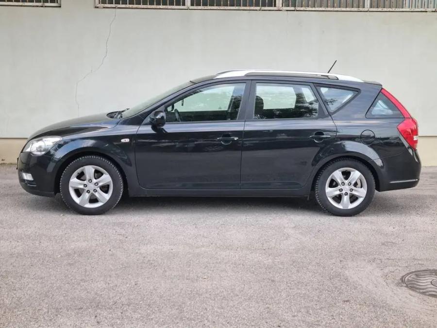 Black Kia Ceed 2012 in Ogre, with an engine capacity of 1.60 L and mileage of 133 thousand km for 3950 €, photo 6 on AUTOMOTO.COM.LV