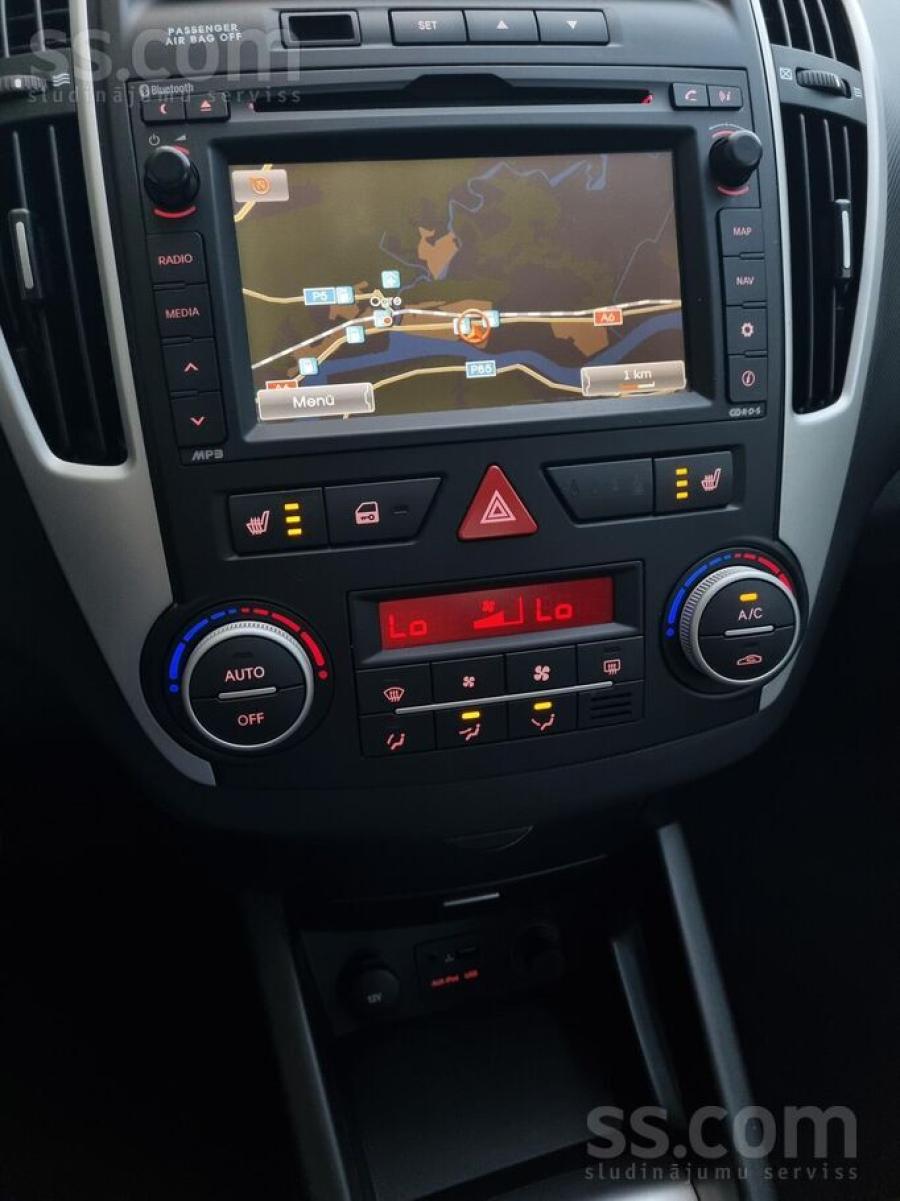 Black Kia Ceed 2012 in Ogre, with an engine capacity of 1.60 L and mileage of 133 thousand km for 3950 €, photo 23 on AUTOMOTO.COM.LV