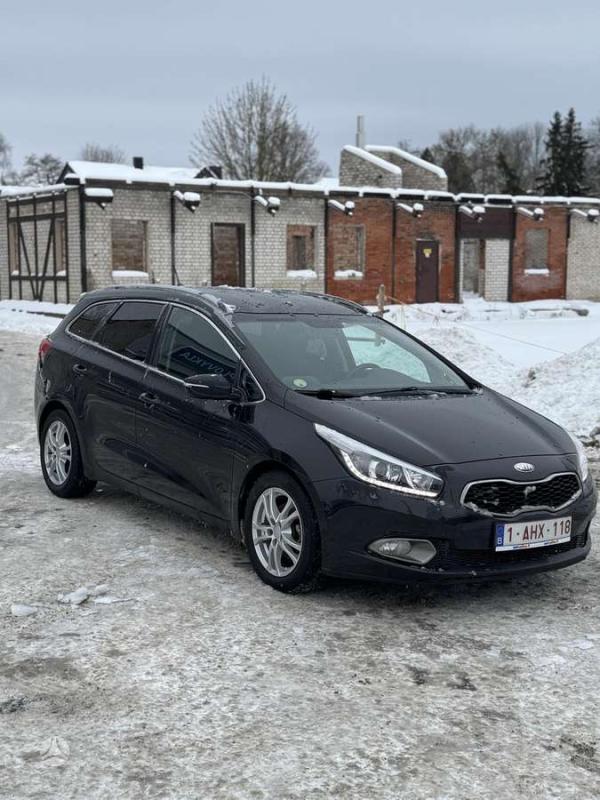Black Kia Ceed 2013 in Ukmerge, with an engine capacity of 1.40 L and mileage of 242 thousand km for 3950 €, photo 2 on AUTOMOTO.COM.LV
