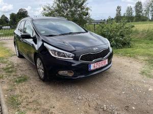 Black Kia Ceed 2013 in Sakiai, with an engine capacity of 1.58 L and mileage of 428 thousand km for 2999 €, photo 3 on AUTOMOTO.COM.LV