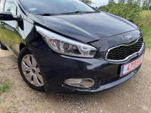 Black Kia Ceed 2013 in Sakiai, with an engine capacity of 1.58 L and mileage of 428 thousand km for 2999 €, photo 5 on AUTOMOTO.COM.LV
