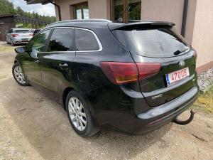 Black Kia Ceed 2013 in Sakiai, with an engine capacity of 1.58 L and mileage of 428 thousand km for 2999 €, photo 12 on AUTOMOTO.COM.LV