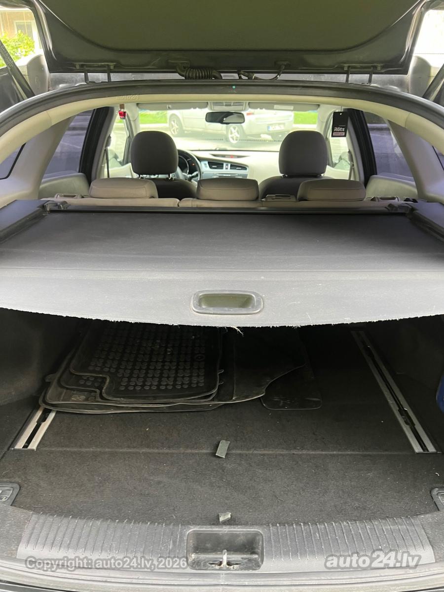 Black Kia Ceed 2013 in Tallinn, with an engine capacity of 1.60 L and mileage of 235 thousand km for 4650 €, photo 14 on AUTOMOTO.COM.LV