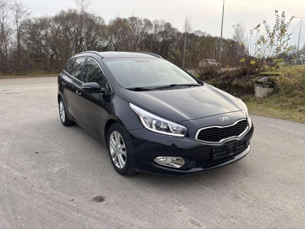 Black Kia Ceed 2014 in Taurage, with an engine capacity of 1.58 L and mileage of 232 thousand km for 3900 €, photo 1 on AUTOMOTO.COM.LV