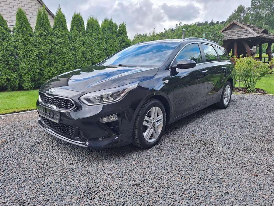 Black Kia Ceed 2021 in Kaunas, with an engine capacity of 1.60 L and mileage of 150 thousand km for 11800 €, photo 3 on AUTOMOTO.COM.LV