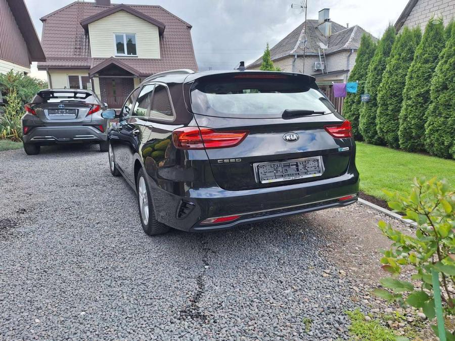 Black Kia Ceed 2021 in Kaunas, with an engine capacity of 1.60 L and mileage of 150 thousand km for 11800 €, photo 6 on AUTOMOTO.COM.LV