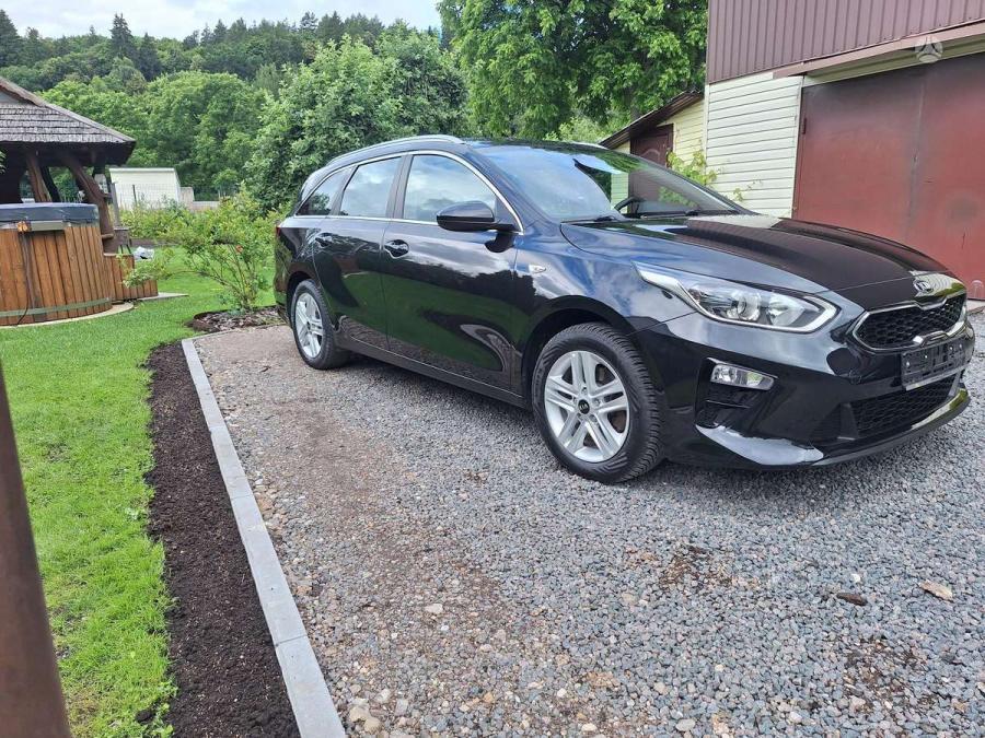 Black Kia Ceed 2021 in Kaunas, with an engine capacity of 1.60 L and mileage of 150 thousand km for 11800 €, photo 9 on AUTOMOTO.COM.LV