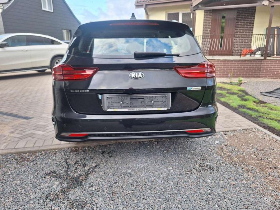 Black Kia Ceed 2021 in Kaunas, with an engine capacity of 1.60 L and mileage of 150 thousand km for 11800 €, photo 14 on AUTOMOTO.COM.LV