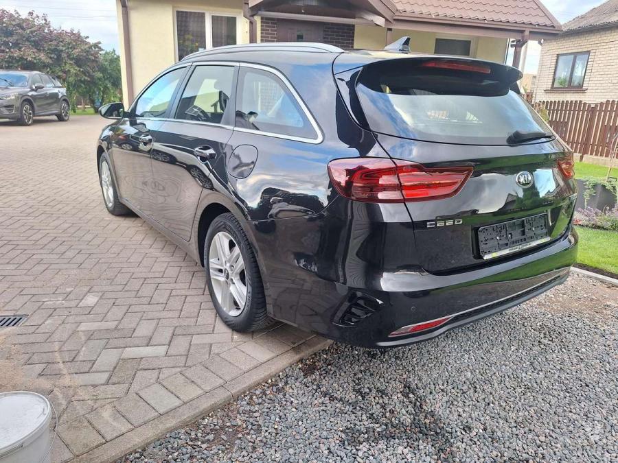Black Kia Ceed 2021 in Kaunas, with an engine capacity of 1.60 L and mileage of 150 thousand km for 11800 €, photo 15 on AUTOMOTO.COM.LV