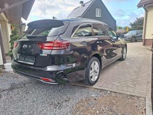 Black Kia Ceed 2021 in Kaunas, with an engine capacity of 1.60 L and mileage of 150 thousand km for 11800 €, photo 16 on AUTOMOTO.COM.LV