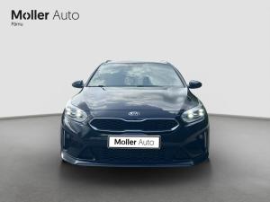 Black Kia Ceed 2021 in Parnu, with an engine capacity of 1.40 L and mileage of 104 thousand km for 17950 €, photo 4 on AUTOMOTO.COM.LV