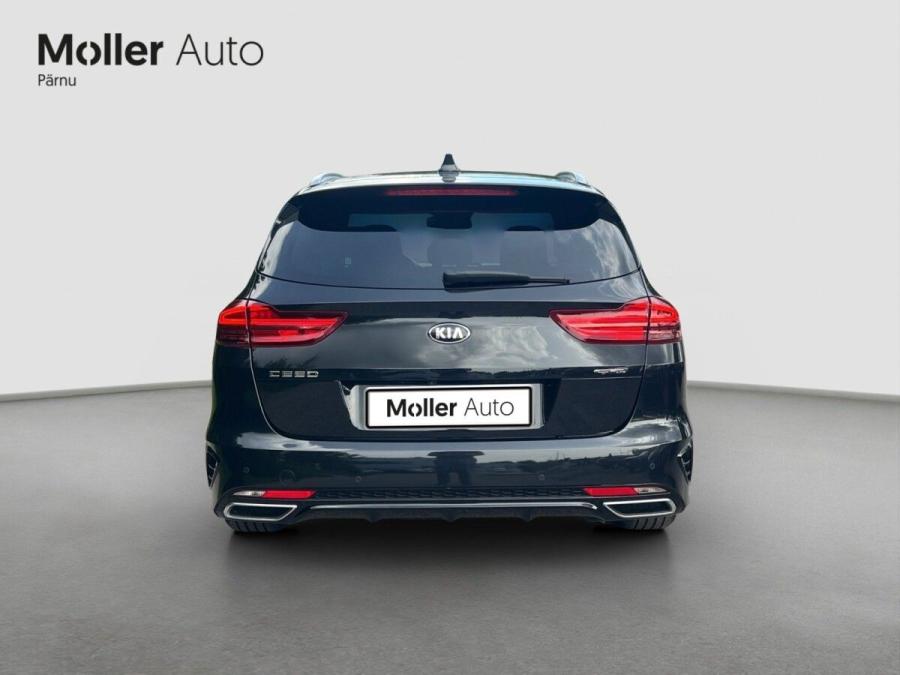 Black Kia Ceed 2021 in Parnu, with an engine capacity of 1.40 L and mileage of 104 thousand km for 17950 €, photo 5 on AUTOMOTO.COM.LV