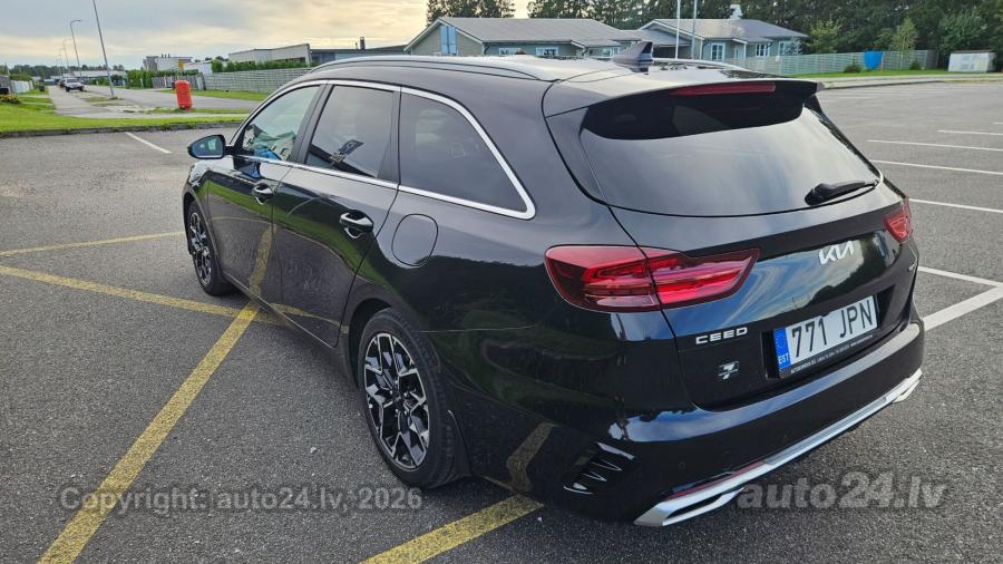 Black Kia Ceed 2021 in Tallinn, with an engine capacity of 1.50 L and mileage of 72 thousand km for 17900 €, photo 5 on AUTOMOTO.COM.LV