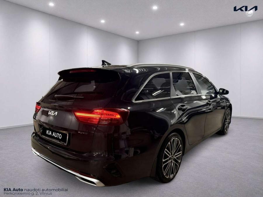 Black Kia Ceed 2023 in Vilnius, with an engine capacity of 1.48 L and mileage of 64 thousand km for 21900 €, photo 3 on AUTOMOTO.COM.LV